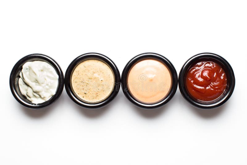 Different Sauces in Assortment in Black Sauces Stock Photo - Image of ...
