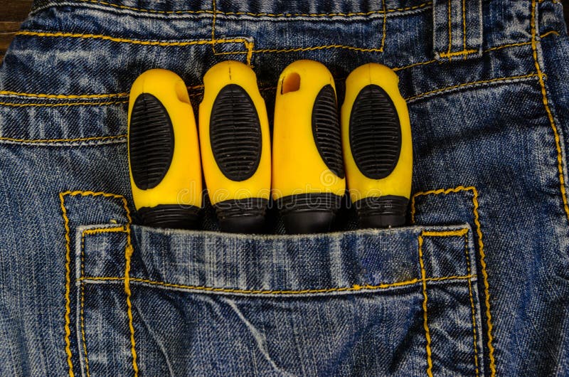 Different Screwdrivers in a Pocket of the Jeans Stock Photo - Image of ...