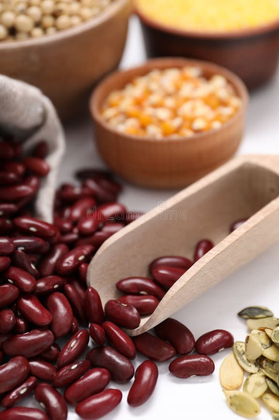 Different Seeds and Legumes on Grey Table, Closeup Stock Image - Image ...
