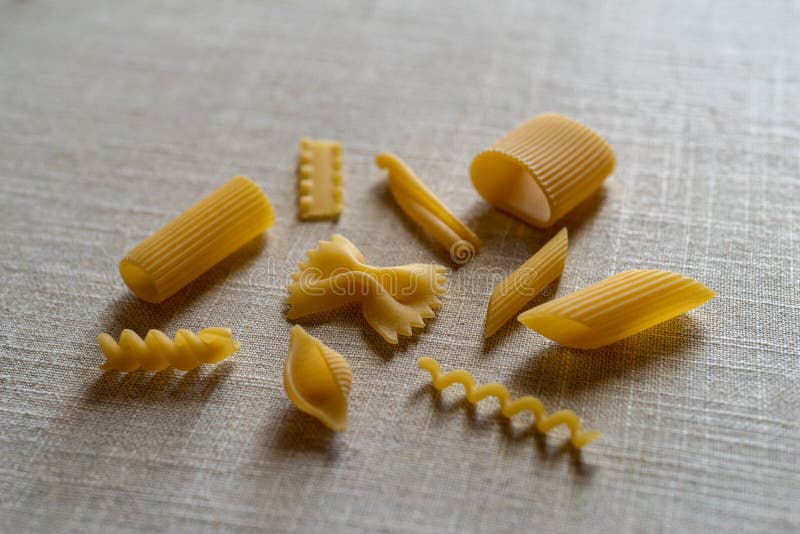 Different Shapes Dry Pasta on Table Stock Image - Image of penne ...