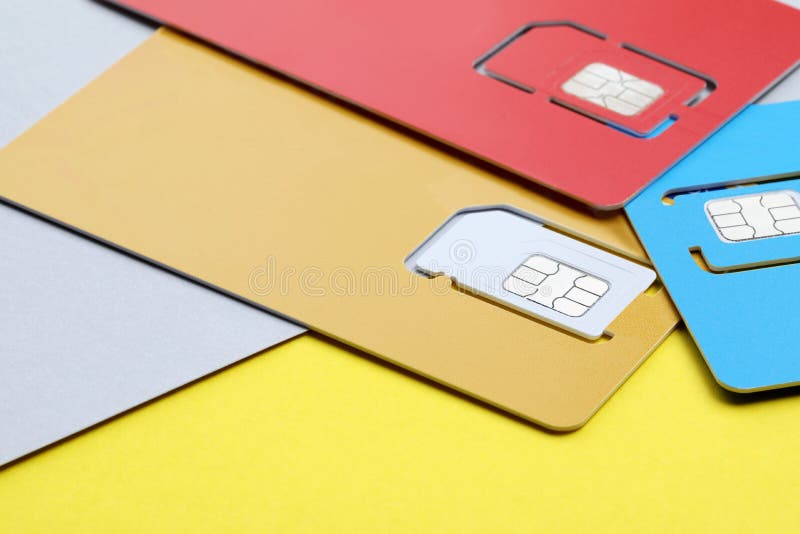 Different SIM Cards on Yellow Background, Closeup Stock Photo - Image ...