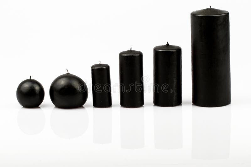 Different Sized Candles on a White Background Stock Photo - Image of ...