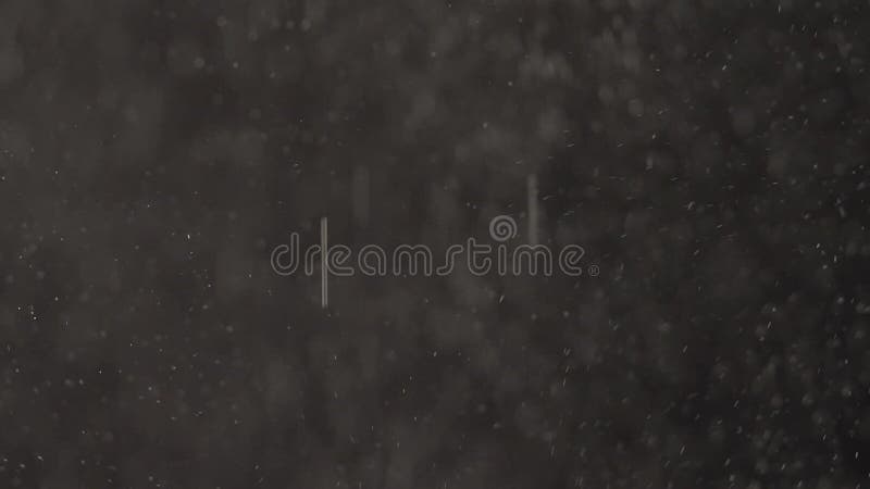 Different Sized Pieces of Dust Falling from Above. Slow Motion Stock ...