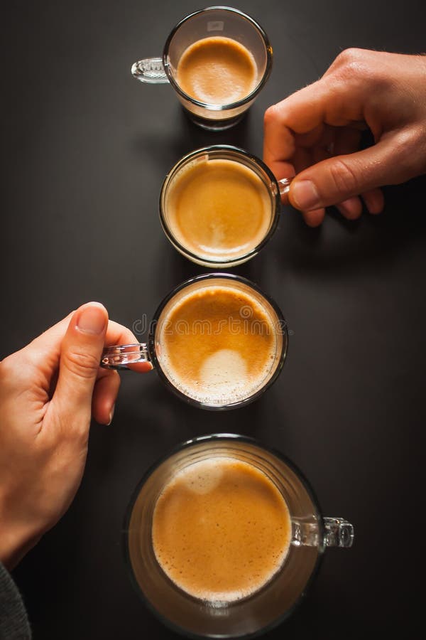 Different Sizes of Cups of Coffee Stock Image - Image of hand, cups ...