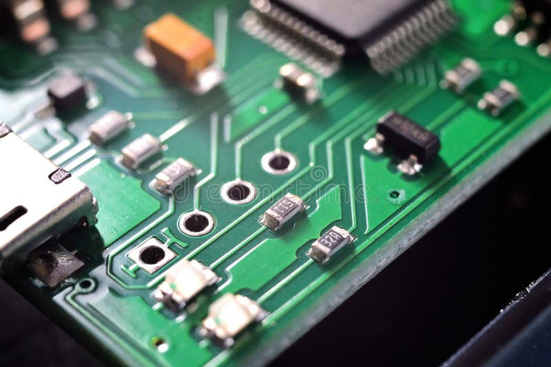 Different SMD Components on Green PCB with a Lot of Surface Mount Chip ...