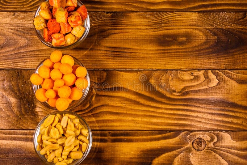 Different Snacks for Beer on Wooden Table. Top View Stock Photo - Image ...