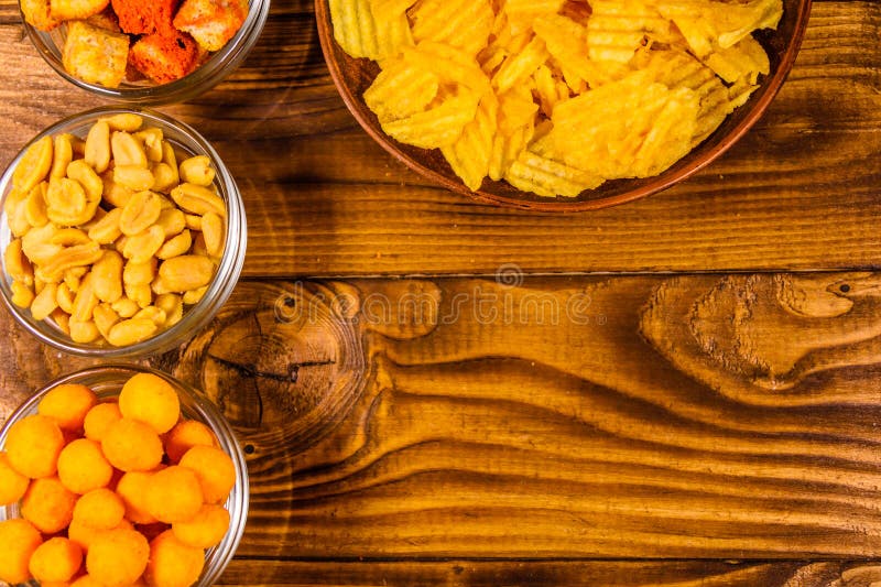 Different Snacks for Beer on Wooden Table. Top View Stock Image - Image ...