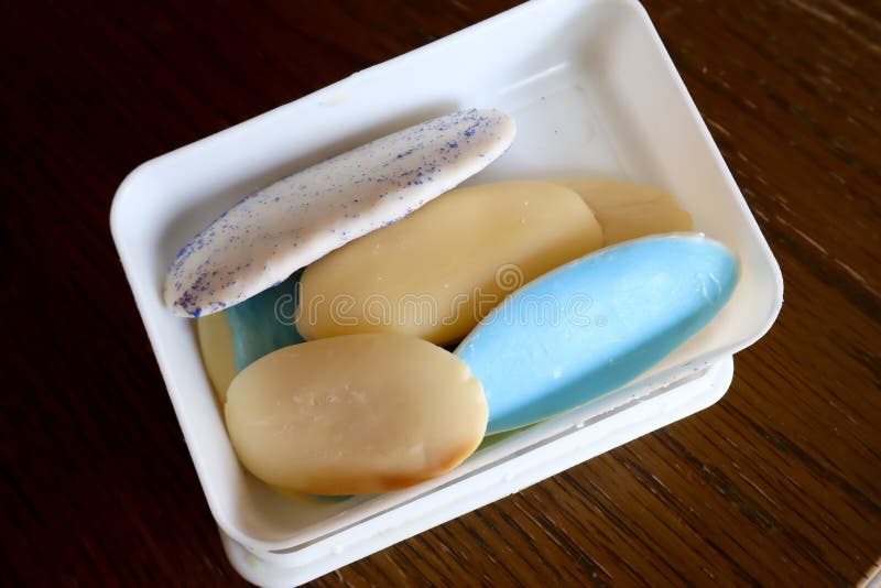 Different Soaps and Remnants in White Plastic Box on Wooden Table Lot ...
