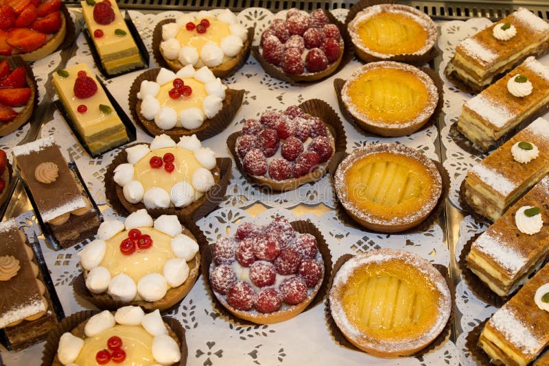 Different Sort of Beautiful Pastry, Small Colorful Sweet Cakes Stock ...