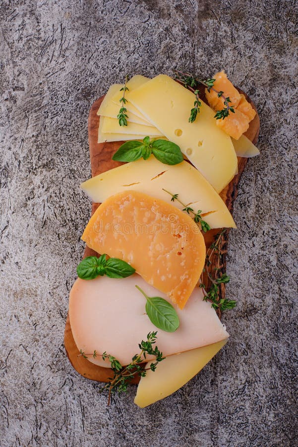 Parmesan, Cheddar, Gouda and Maasdam Cheese Stock Image - Image of ...