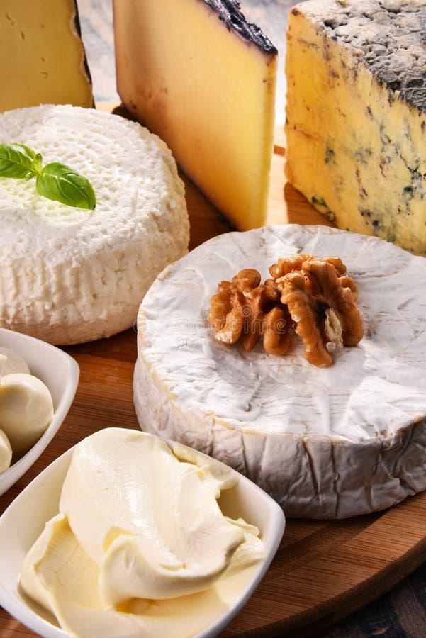 Different Sorts of Cheese on Kitchen Table Stock Image - Image of food ...