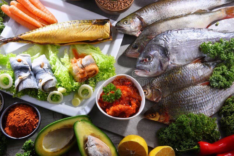 Different Sorts of Fish on Kitchen Table Stock Image - Image of food ...