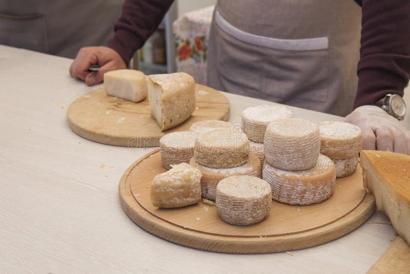 Different Sorts of Italian Cheese Wheels at a Market Stock Image ...
