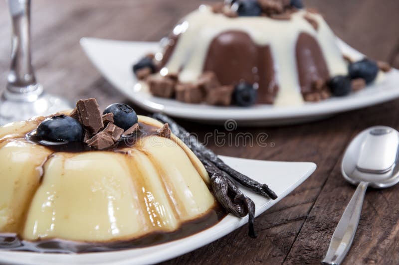 Different Sorts of Pudding on Wooden Background Stock Image - Image of ...