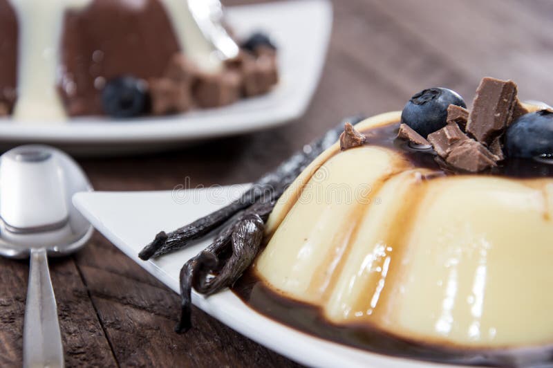 Different Sorts of Pudding on Wooden Background Stock Image - Image of ...