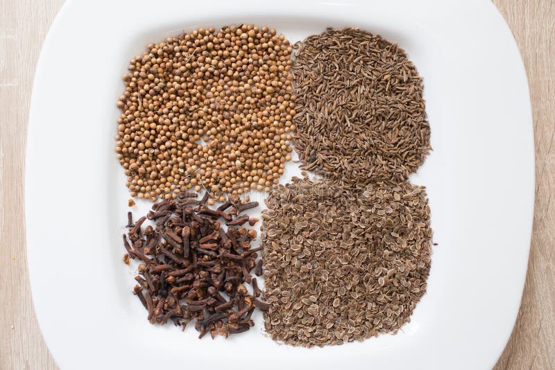 Different spices on plate stock photo. Image of spice - 73699904