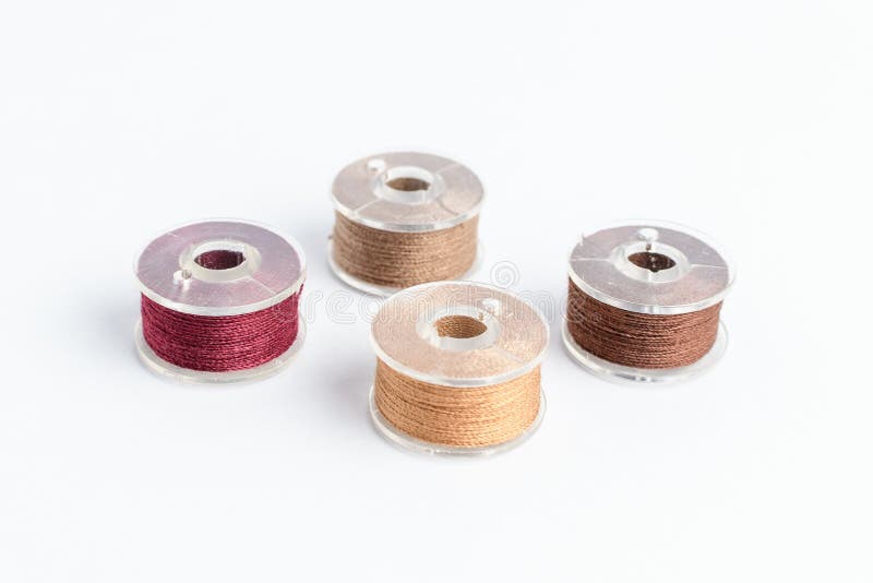 Different Spools of Brown Thread Prepared for Sewing Machine, Isolated ...