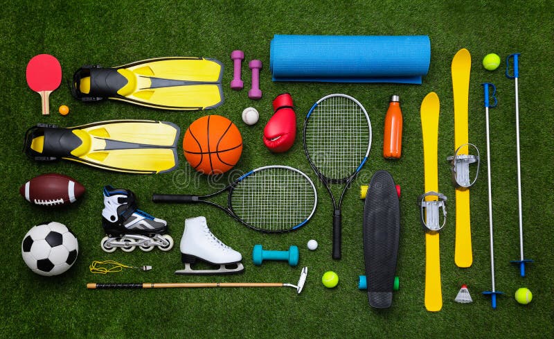 Different Sport Equipment on Green Grass, Flat Lay Stock Image - Image ...