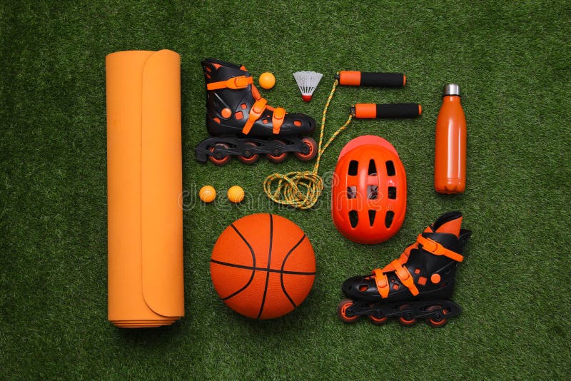 Different Sport Equipment on Grass, Flat Lay Stock Image - Image of ...