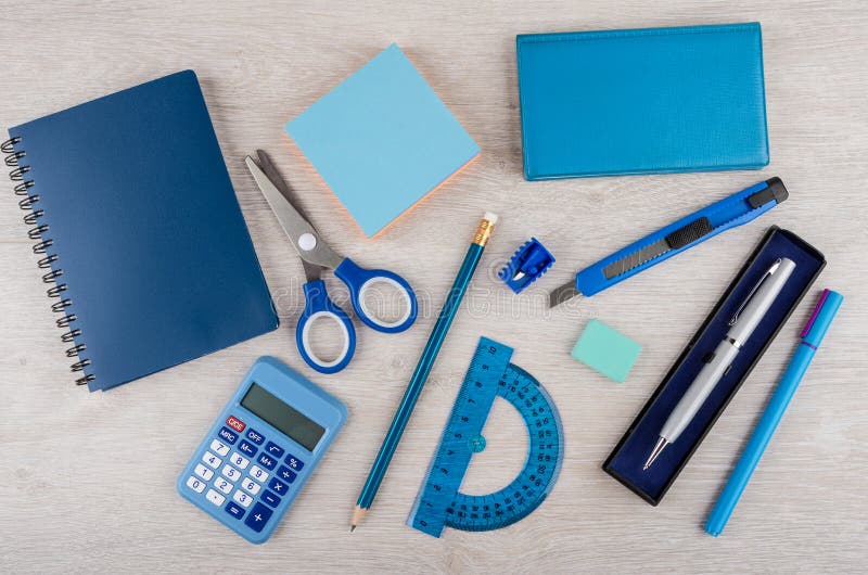 Different Stationery Tools of Blue Color on Light Wooden Table Stock ...