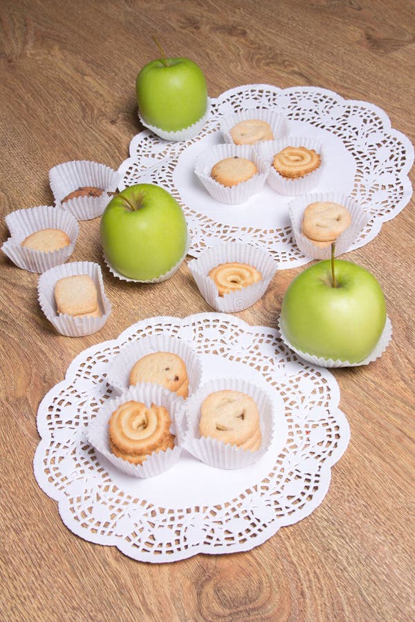 Different Sugar Cookies and Apples on the Table Stock Photo - Image of ...