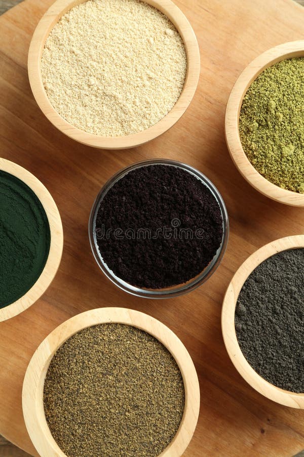 Different Superfood Powders in Bowls on Table, Flat Lay Stock Photo ...