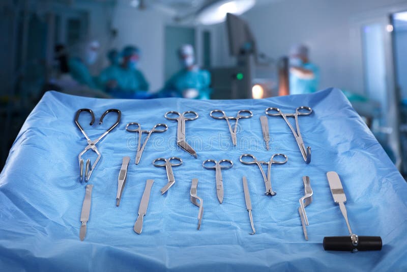 Different Surgical Instruments on Table in Operating Room Stock Photo ...