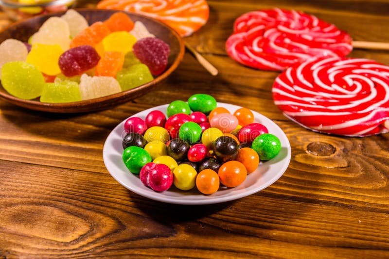 Different Sweet Candies on a Wooden Table Stock Photo - Image of heart ...