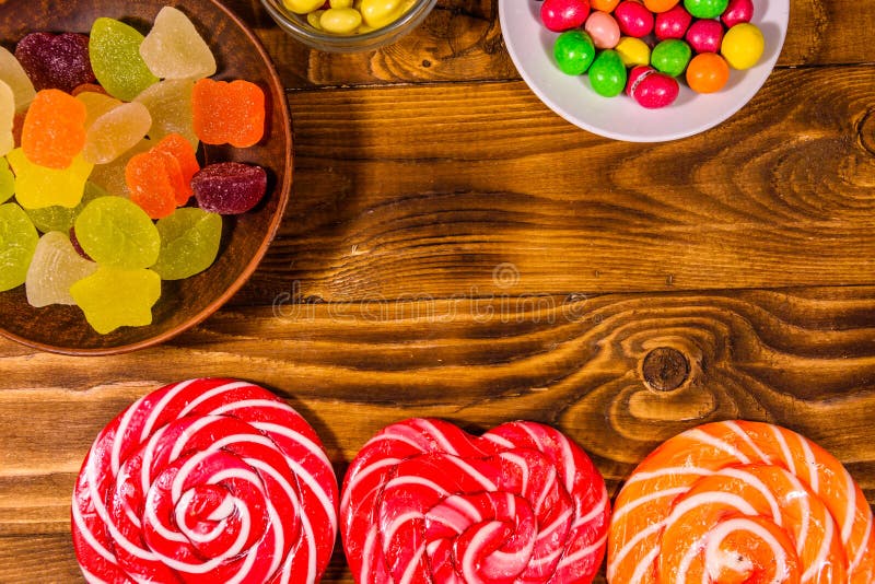 Different Sweet Candies on a Wooden Table. Top View Stock Photo - Image ...