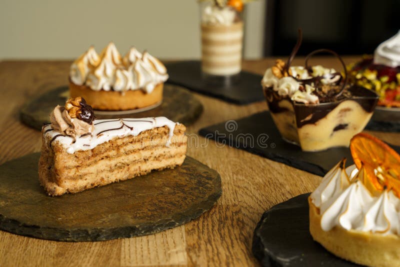 Different Sweet Desserts on a Wooden Table Stock Photo - Image of ...
