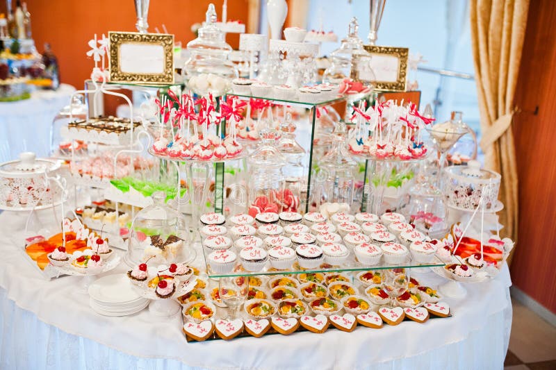 Different Sweets and Cupcakes at Catering Wedding Reception Table ...