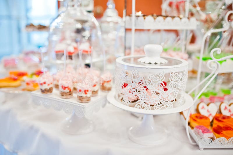 Different Sweets and Cupcakes at Catering Wedding Reception Table ...