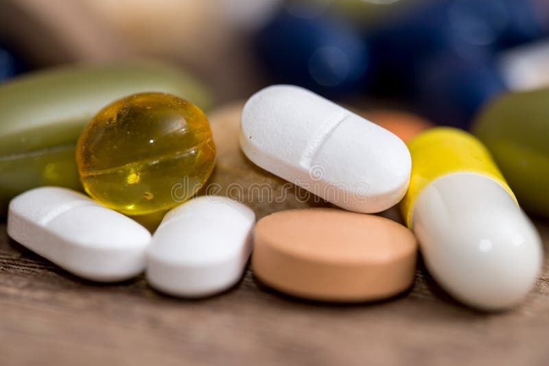 Different tablet on desk stock photo. Image of capsule - 70307116