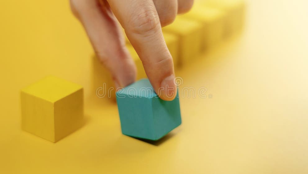 Different, Talent and Outstanding Concept. Hand Picking a Unique Cube ...