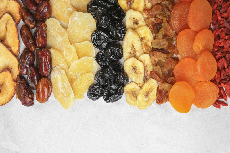 Different Tasty Dried Fruits on Paper, Flat Lay Stock Image - Image of ...