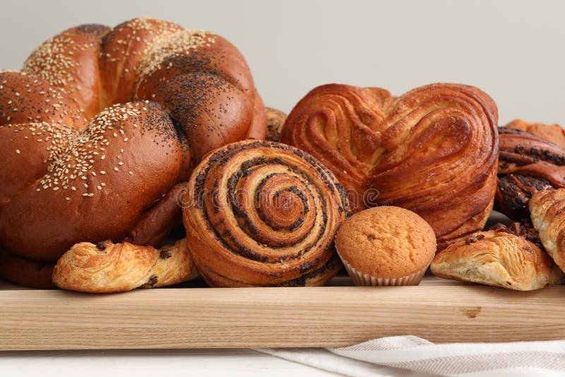 Different Tasty Freshly Baked Pastries on Table Stock Photo - Image of ...