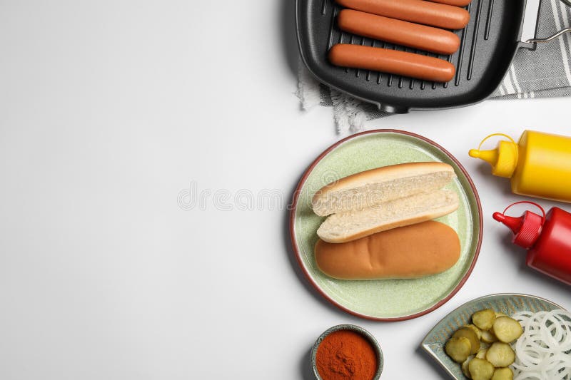 Different Tasty Ingredients for Hot Dog on White Table, Flat Lay. Space ...