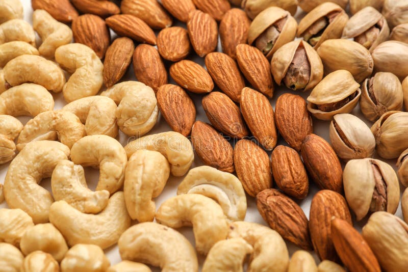 Different Tasty Nuts, Closeup Stock Image - Image of nuts, assorted ...