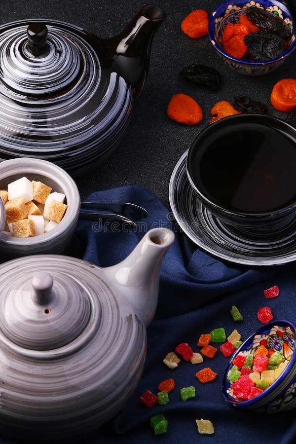 Different Teapots and Sweets. Various Tea and Teapot with Different ...
