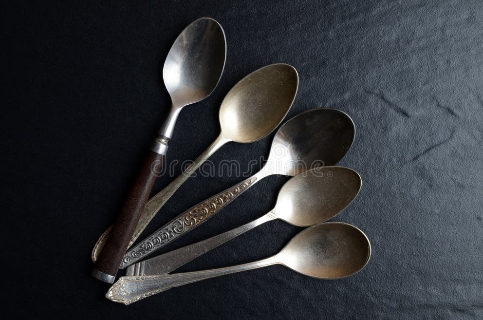 Different Teaspoons on a Table Stock Photo - Image of cloth, table ...