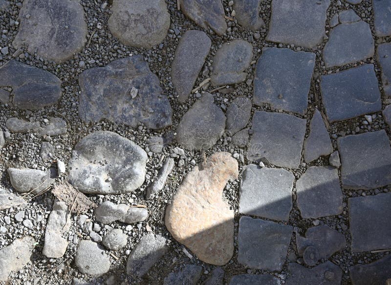 Different Textures of Cobblestones and Gravel Illuminated by Sunlight ...