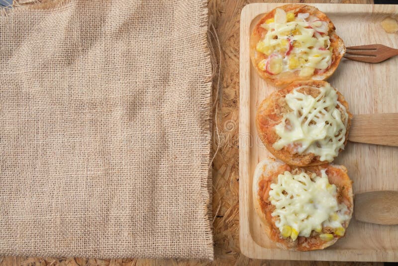 Different Topped Mini Pizza Buns Stock Photo - Image of gourmet, mini ...