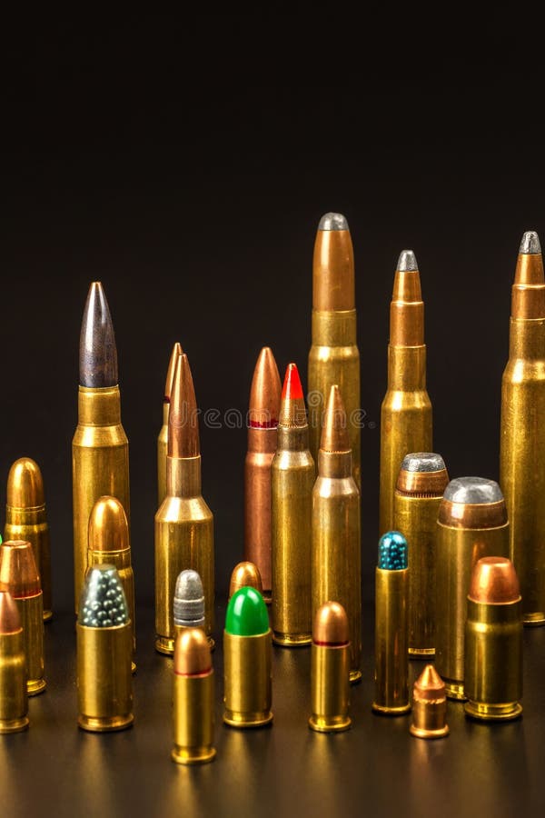 Different Types of Ammunition on a Black Background. Sale of Weapons ...