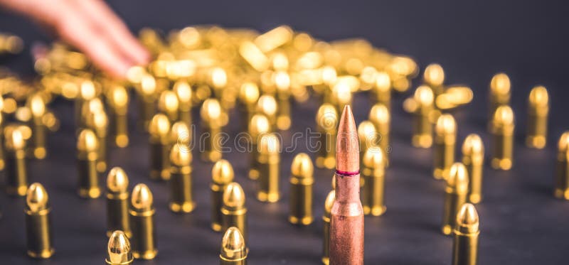 Different Types of Ammunition on Dark Stone. Blur Bullets Backround ...