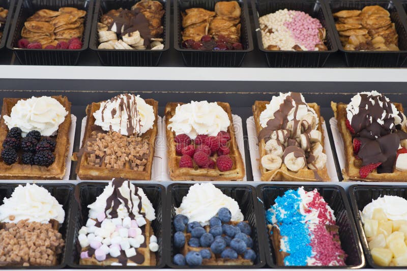 Different Types of Appetizing Waffles with Fruits, Cream and Chocolate ...