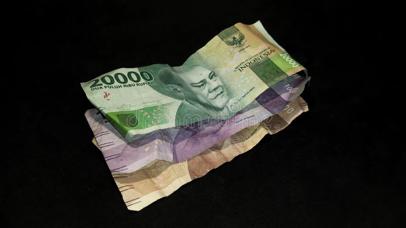 Different Types of Banknotes Stacked on Black Background Stock Image ...