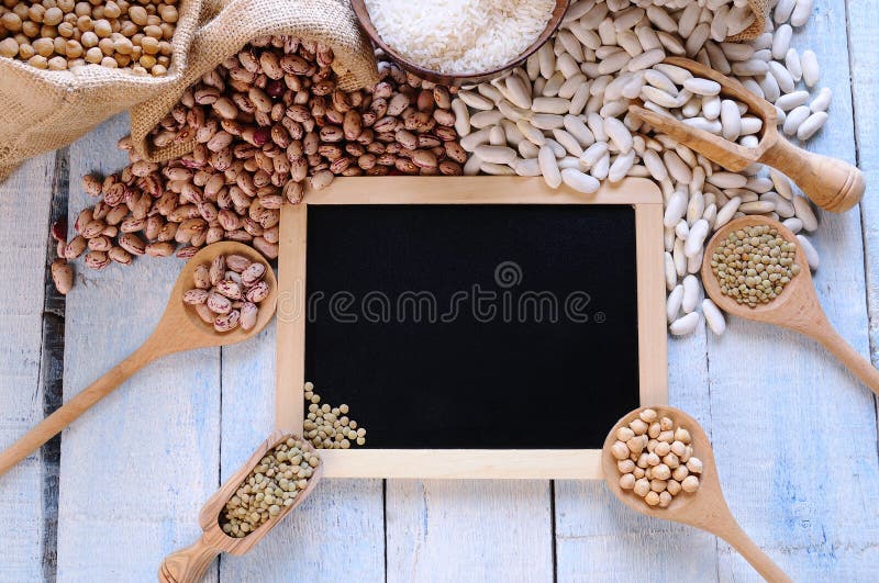 Different Types of Beans Around Black Framed Square on Blue Wood Stock ...