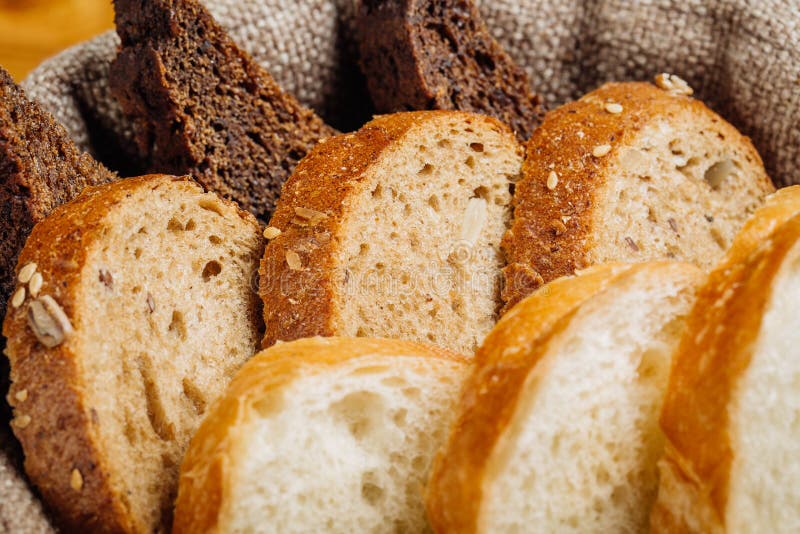 Different Types of Bread in the Basket on the Table Stock Image - Image ...