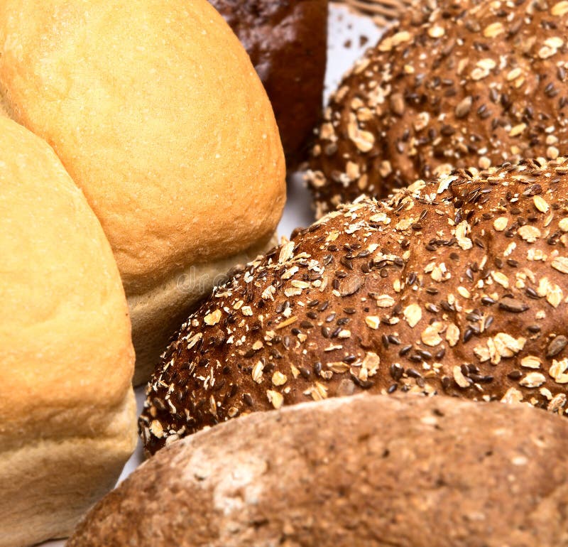 Different Types of Bread in the Basket. Wheat, Rye Bread with Bran ...