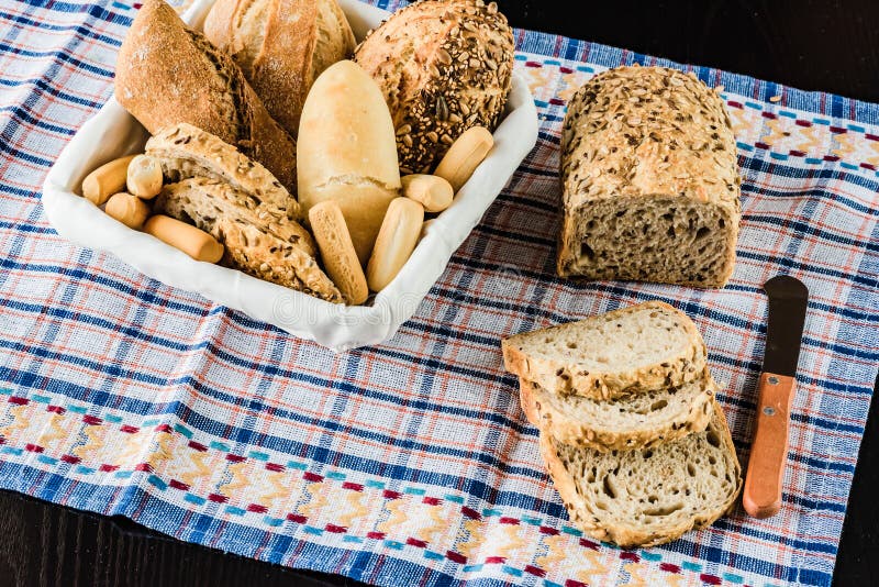 Different Types of Bread Cut into Slices and Whole Stock Photo - Image ...